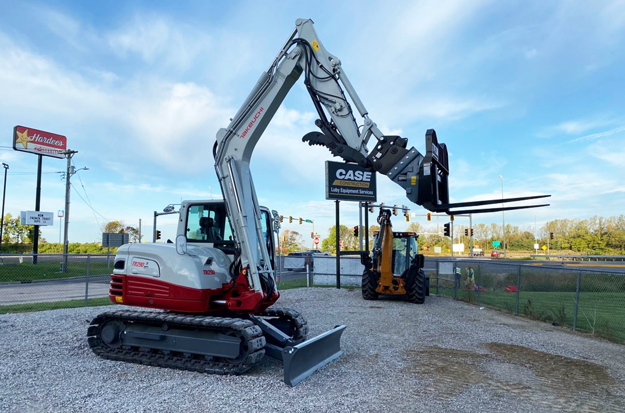 The "Dipper Buddy" Kubota KX080-3 Excavator to Skid Loader Adapter